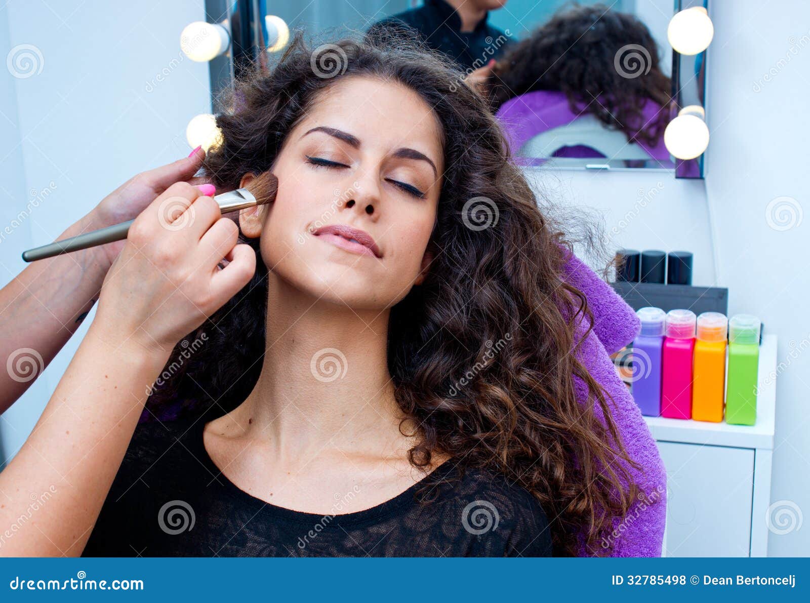 Woman putting make up stock photo. Image of freshness - 32785498