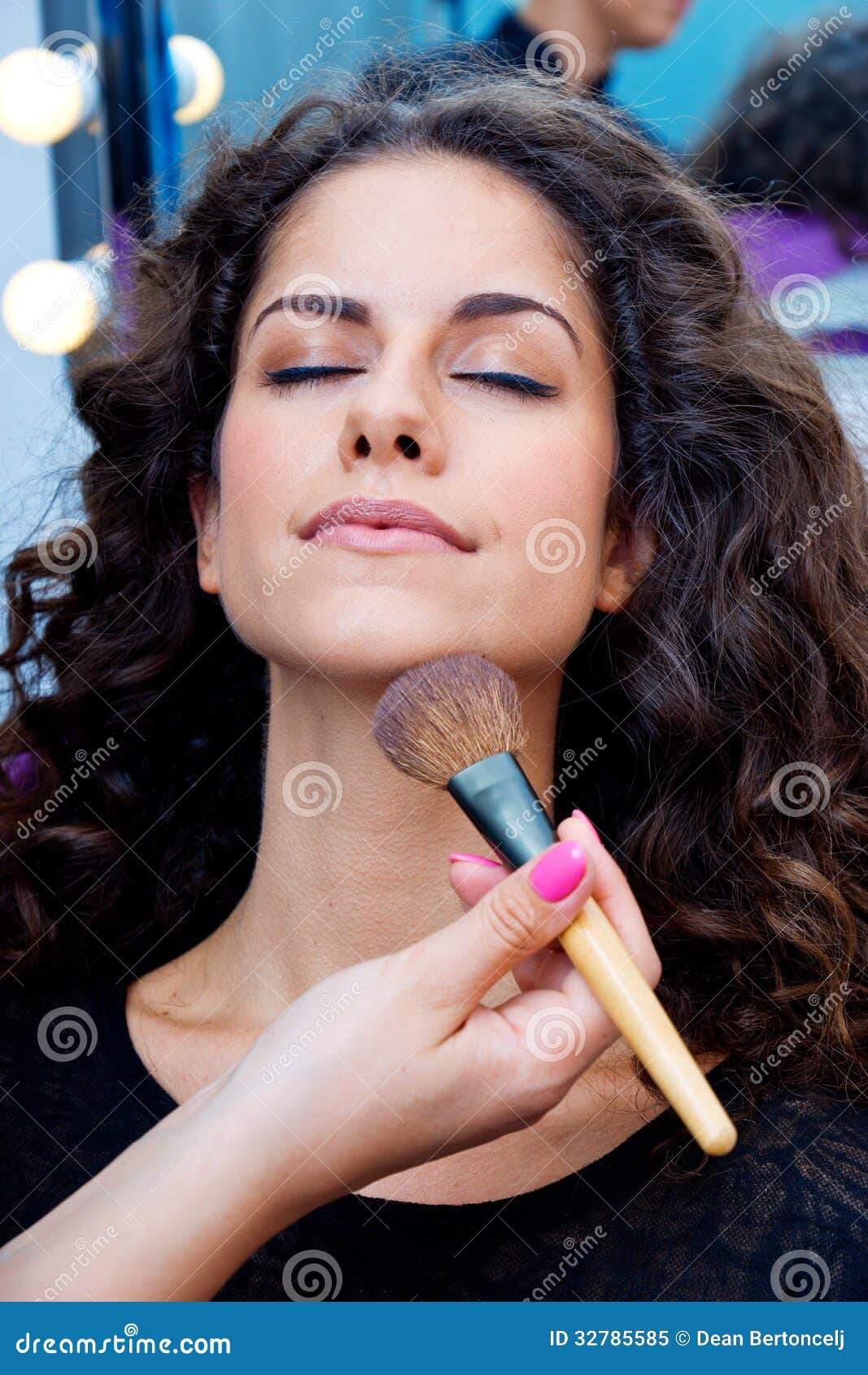 Woman putting make up stock image. Image of hairstyle - 32785585