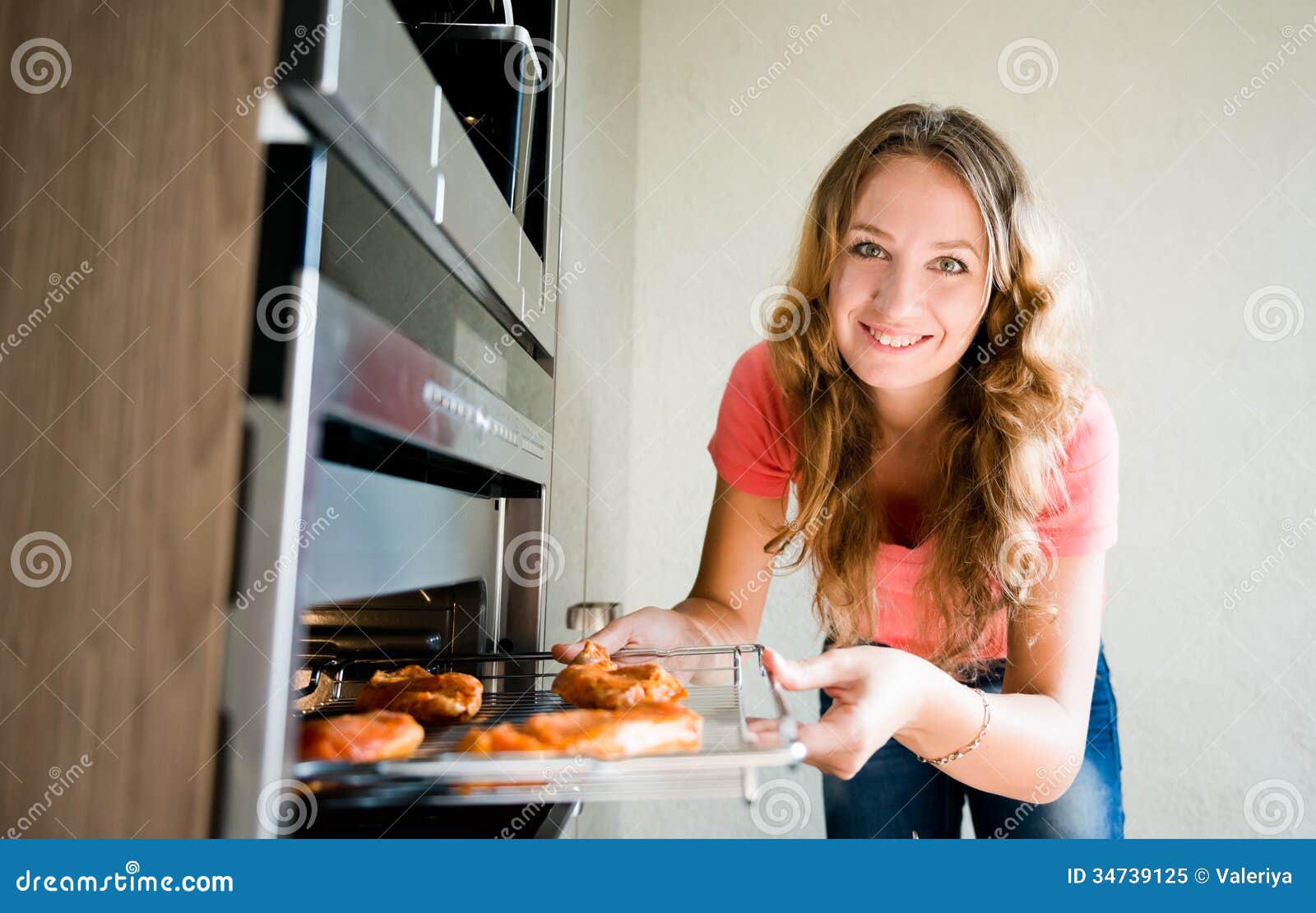 Woman Putting Meat into Oven Stock Image - Image of filler, meat: 34739125