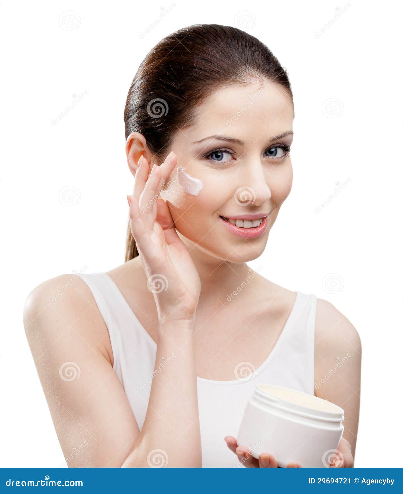 Woman Putting on Moisture Cream from Container on Face Stock Image ...