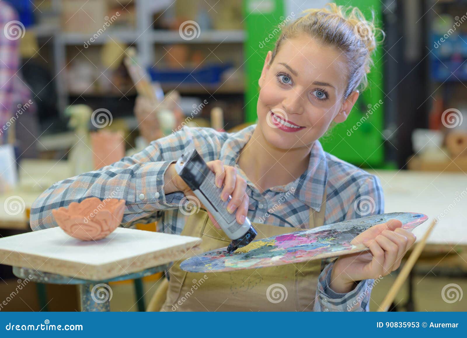 Woman Putting Paint on Palette Stock Image - Image of tube, palette ...