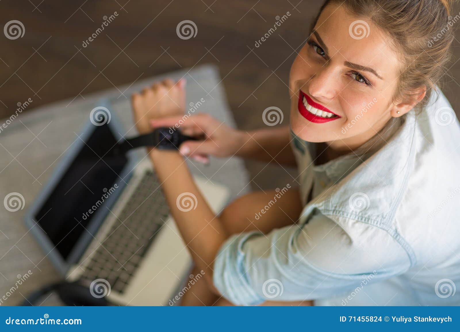 Woman Putting on a Smartwatch Stock Photo - Image of smartwatch ...