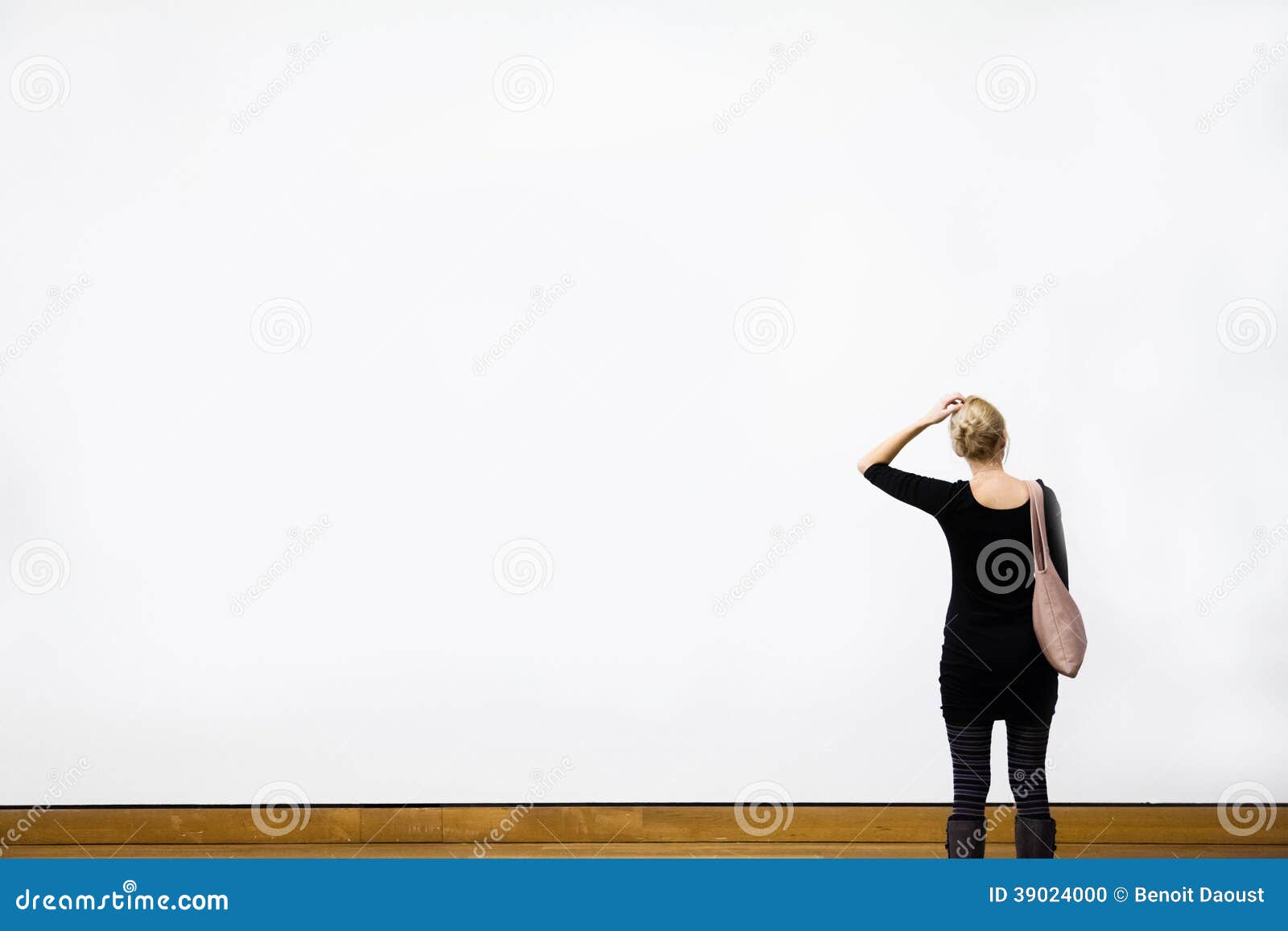 Woman Questioning in Front of a Blank Wall Stock Photo - Image of ...