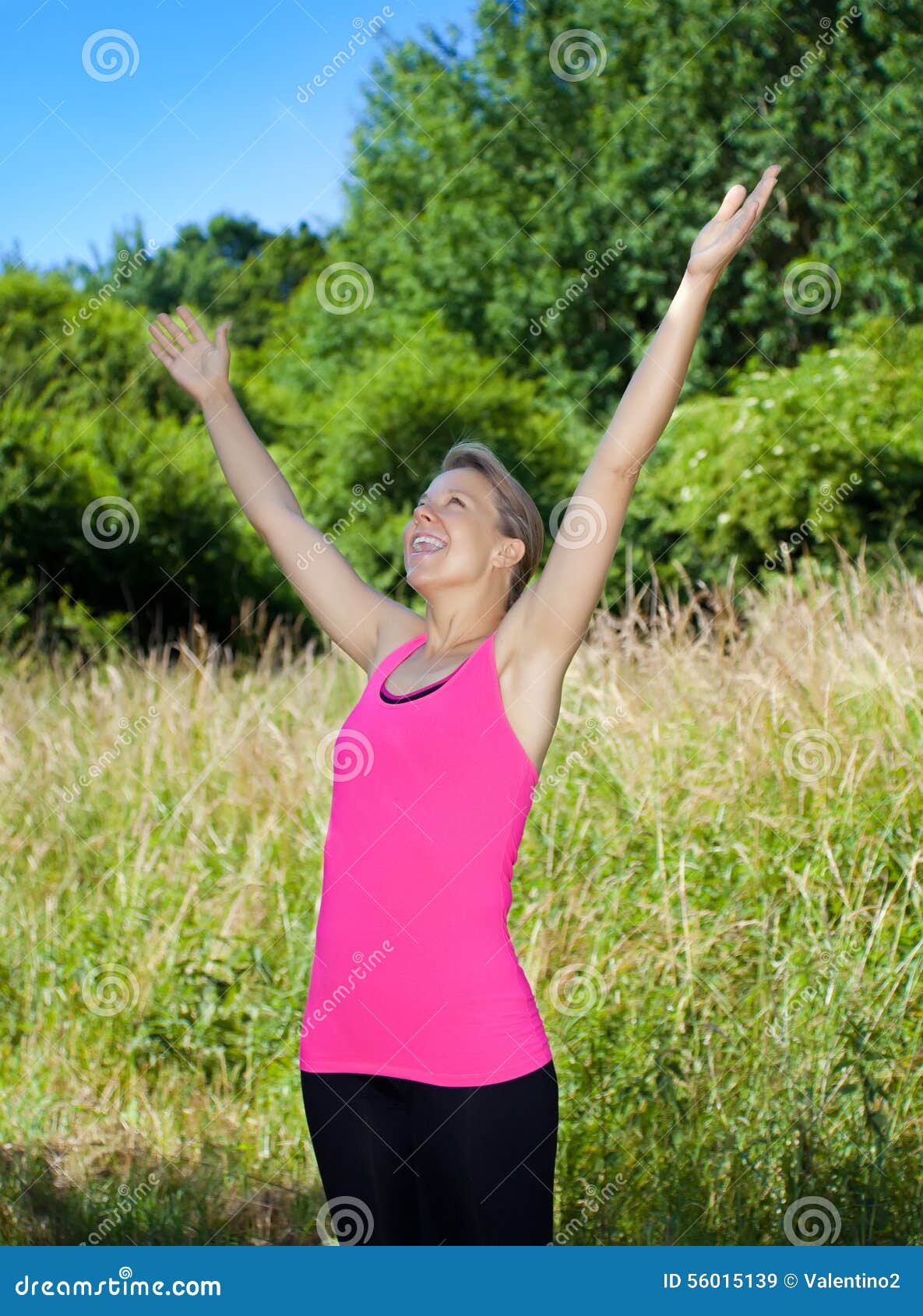 Woman with raised arms stock image. Image of freedom - 56015139