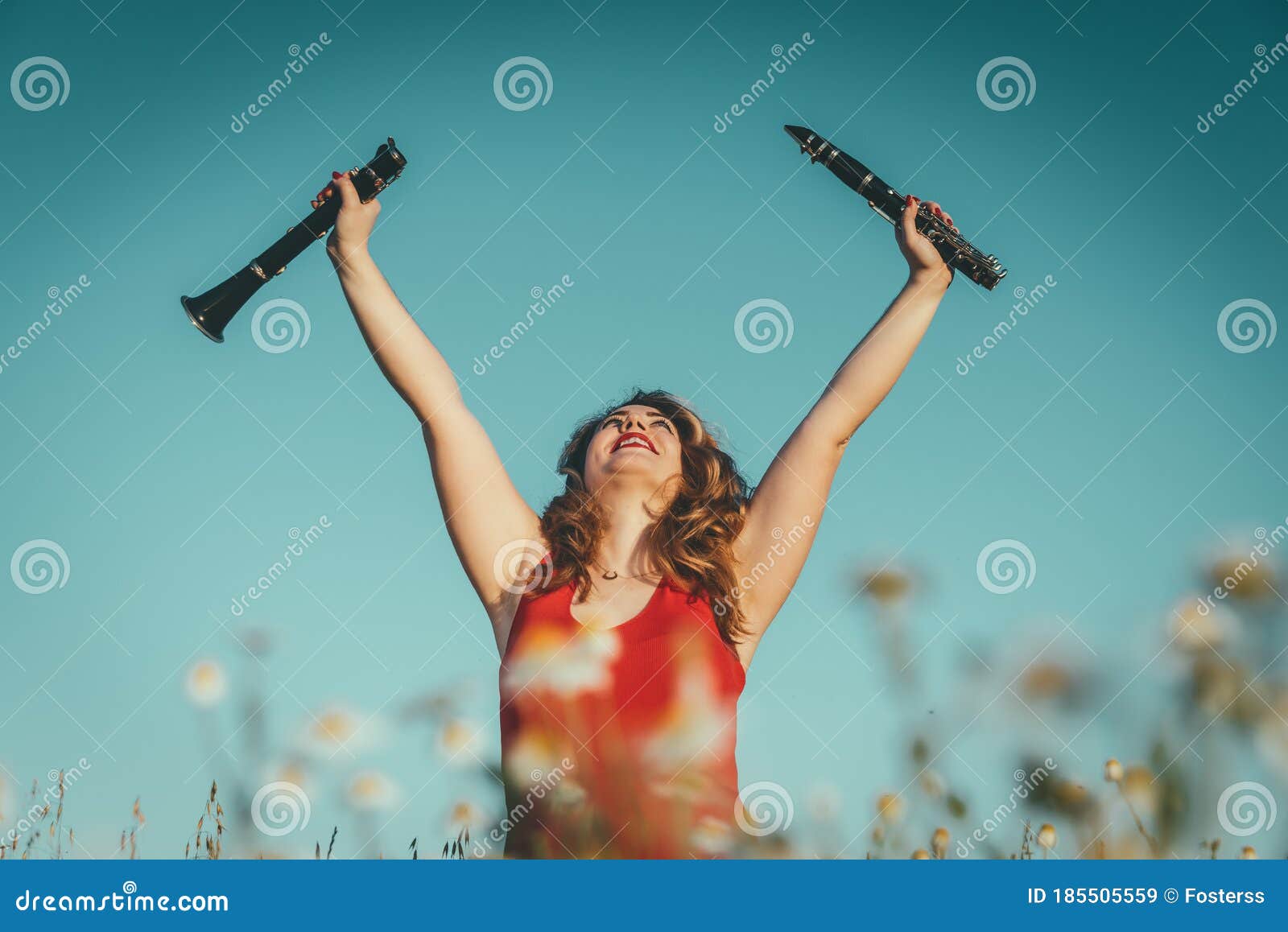 Woman Raising Clarinet on Field Stock Image - Image of instrument ...