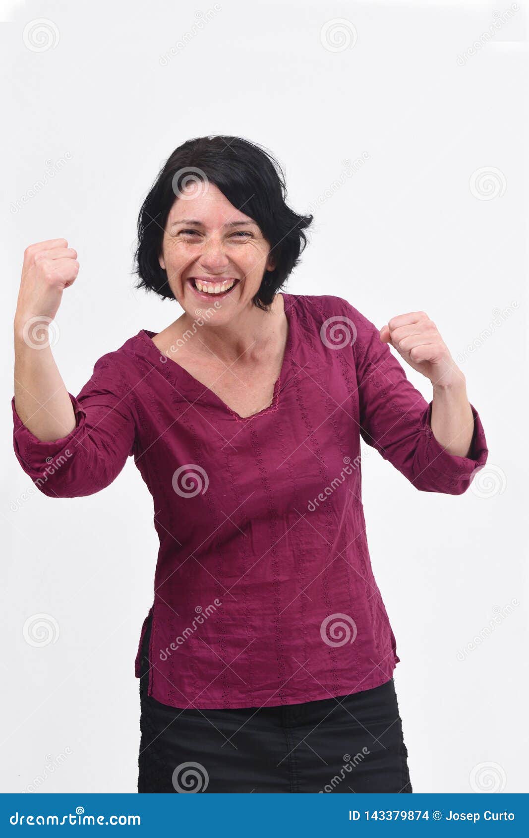 Woman Raising Her Arms and Smiling in Victory Sign on White Background ... Woman Raising Her Arms and Smiling in Victory Sign on White Background ...