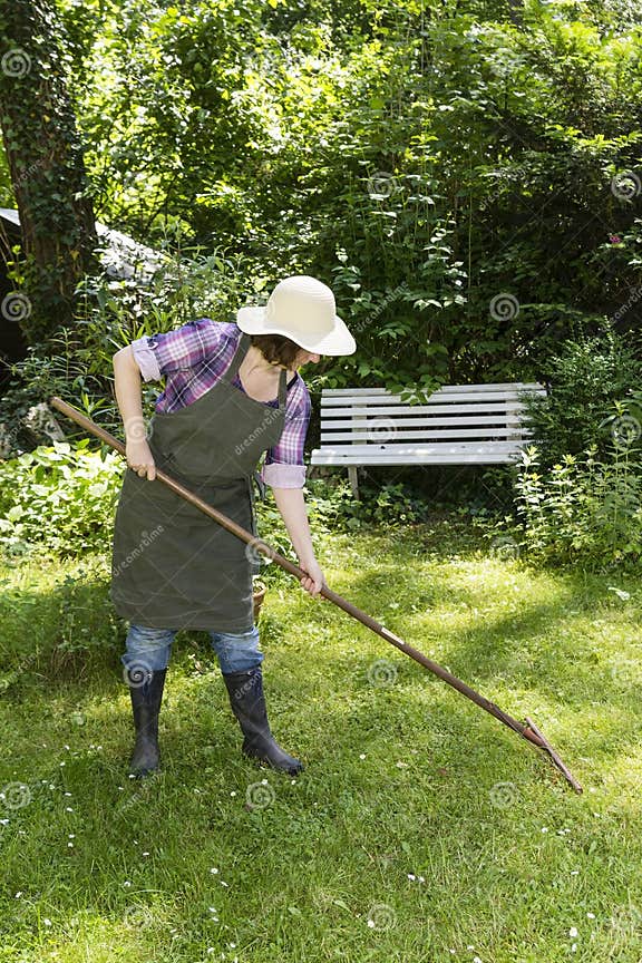 Woman with rake stock image. Image of gardener, work - 50569167