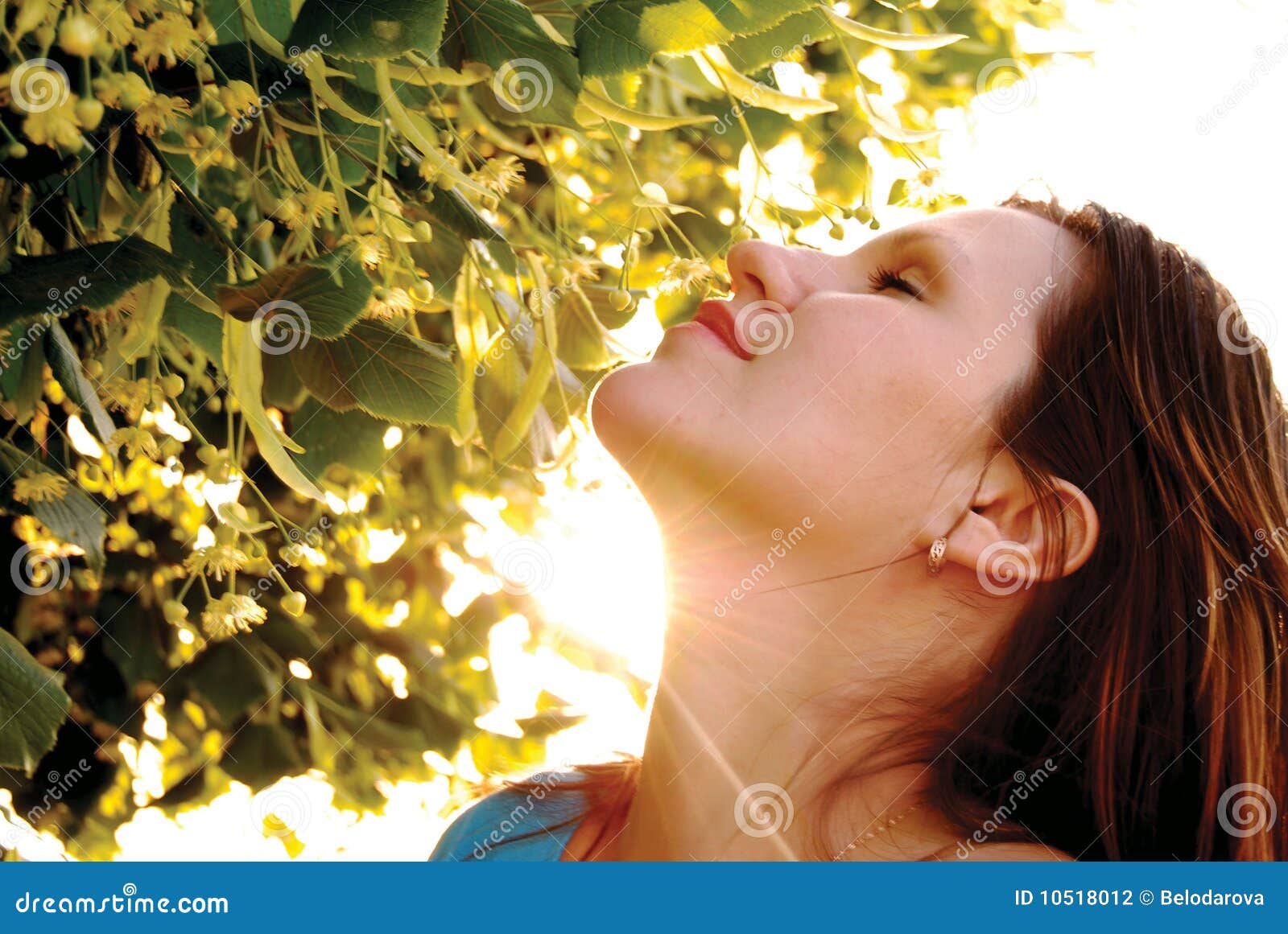 Woman in the rays of a sun stock photo. Image of girl - 10518012