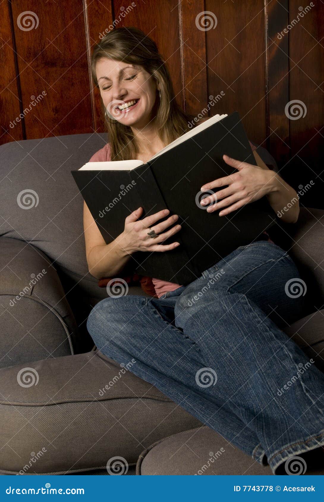 A woman reading a big book stock photo. Image of hands - 7743778