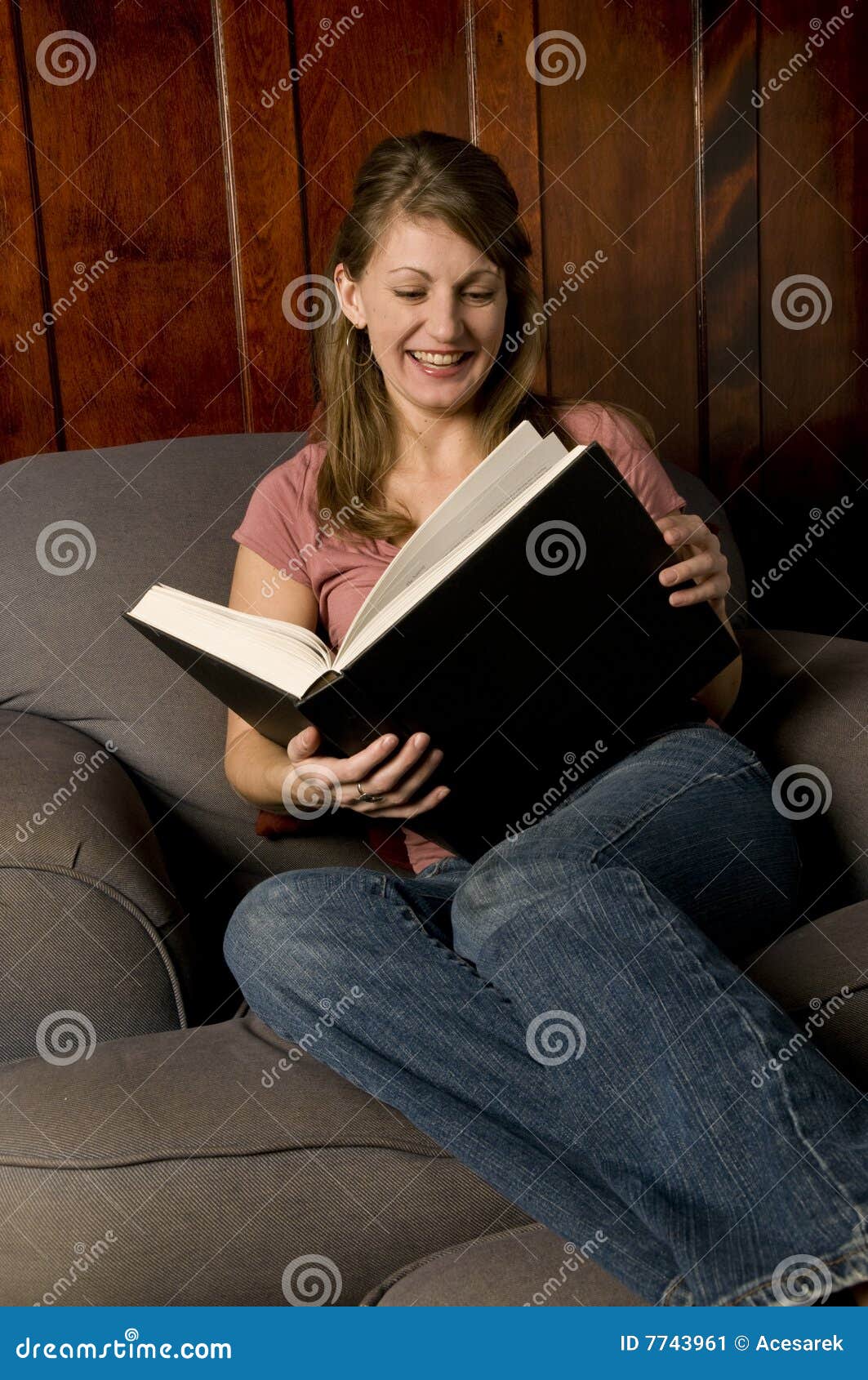 A woman reading a big book stock image. Image of posing - 7743961