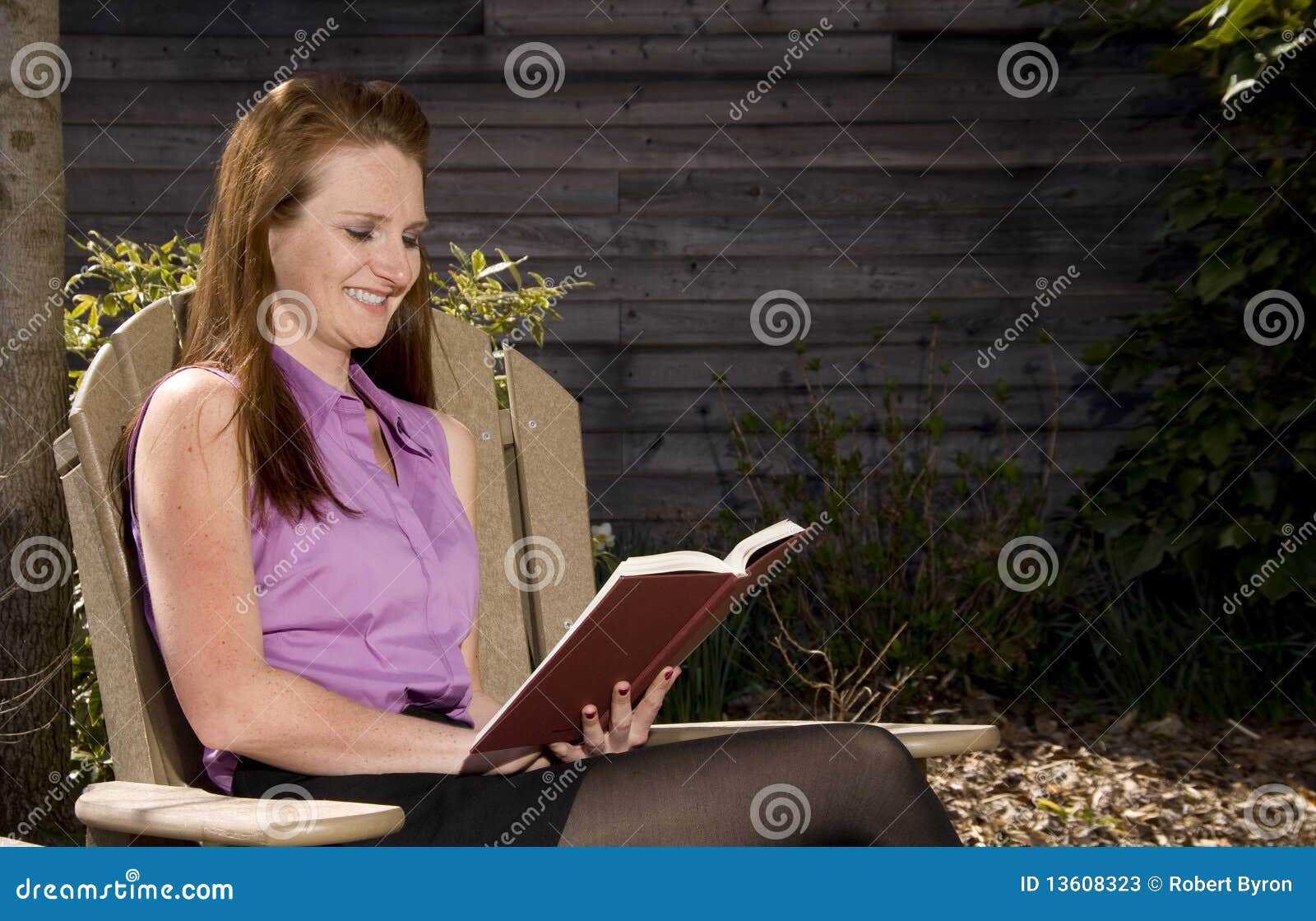 Woman Reading a Book stock image. Image of knowledge - 13608323