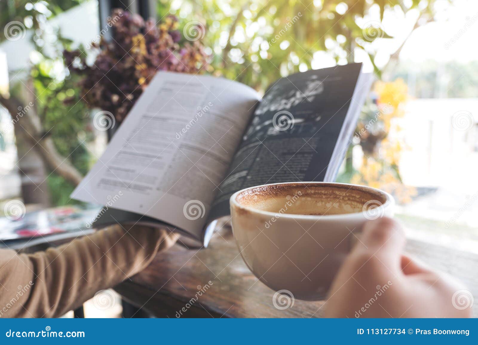 A Woman Reading Book and Drinking Coffee in Cafe Stock Photo - Image of ...