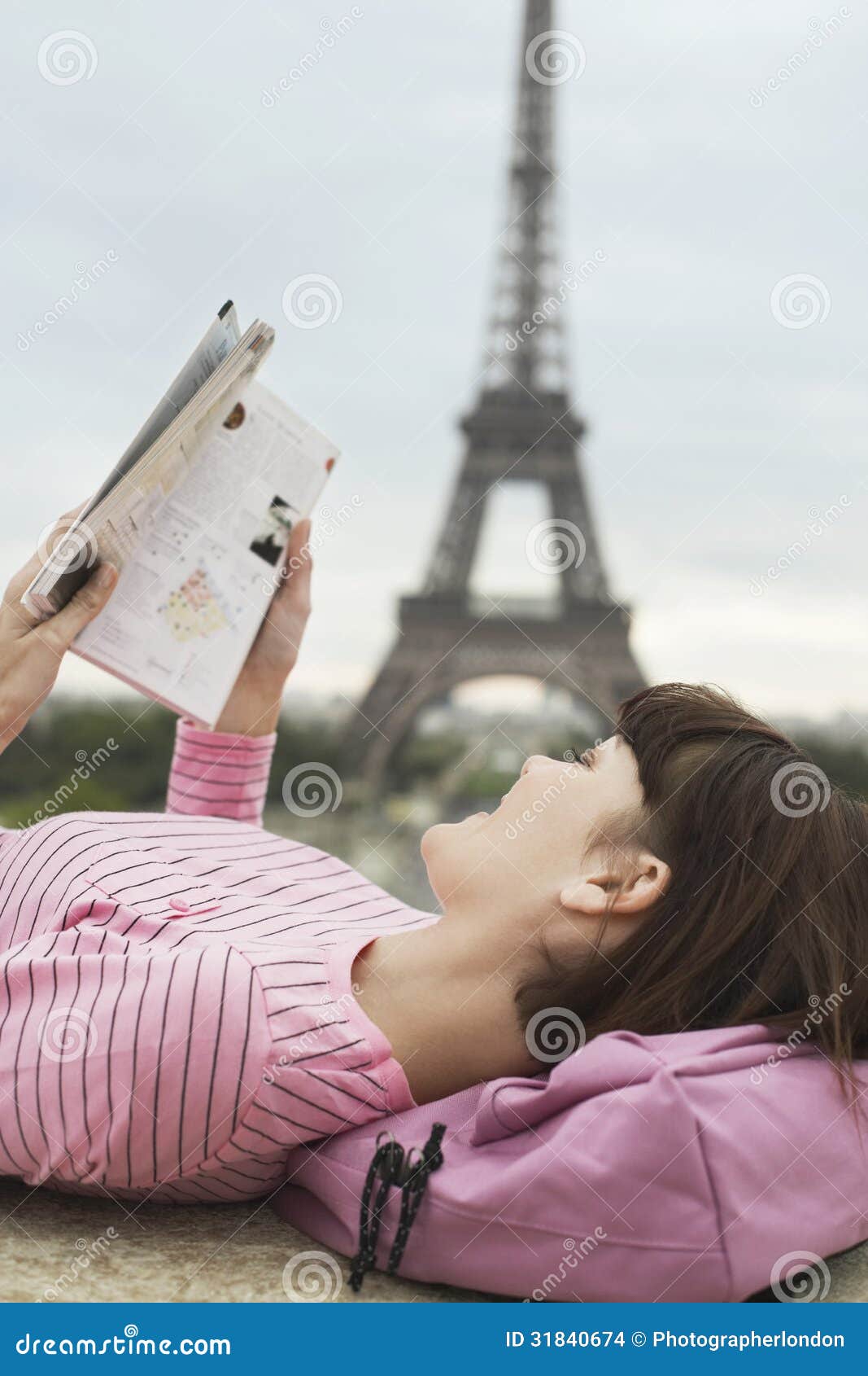 Woman Reading Book in Front of Eiffel Tower Editorial Stock Image ...