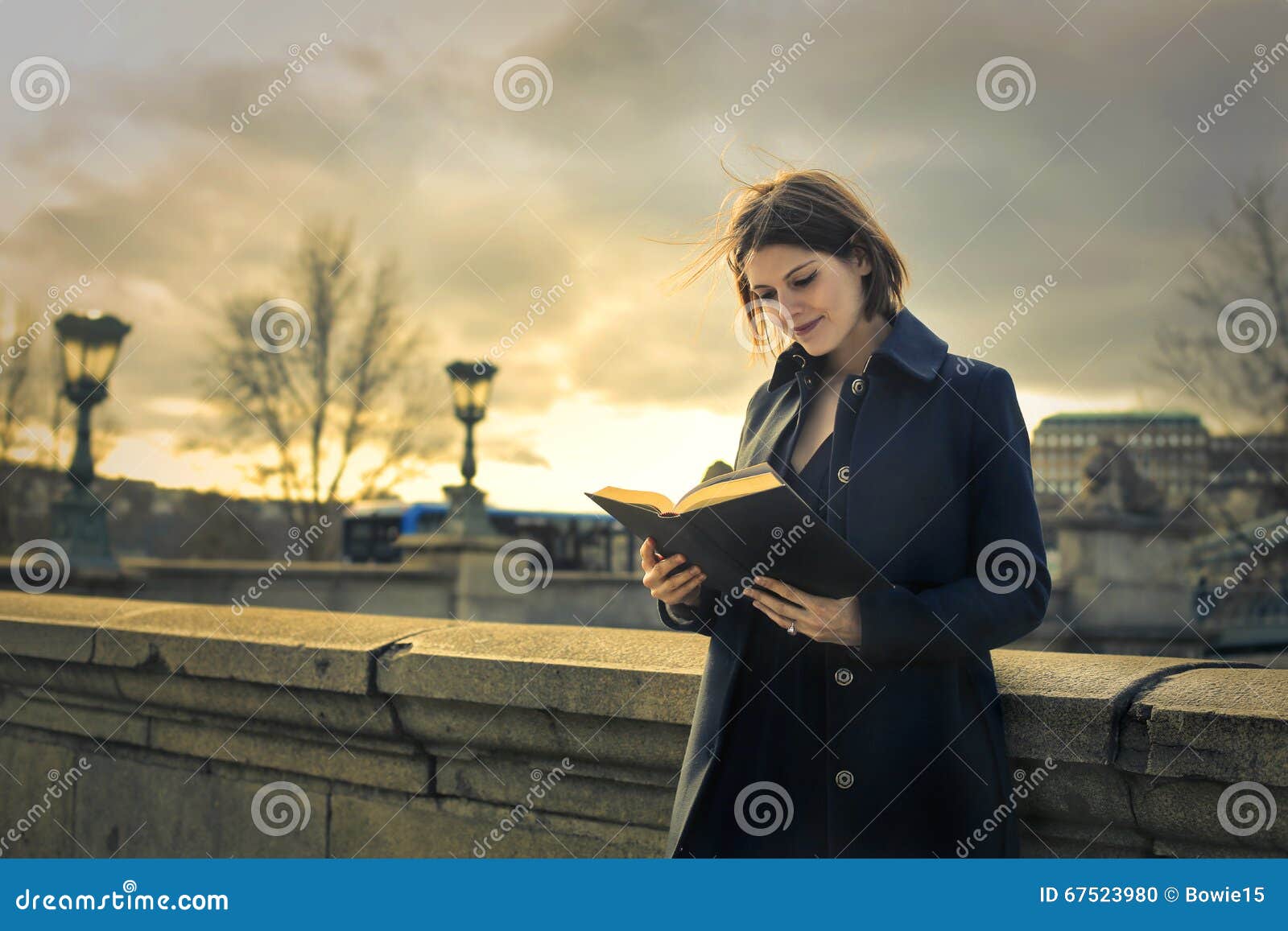 Woman reading a book stock photo. Image of pleausure - 67523980