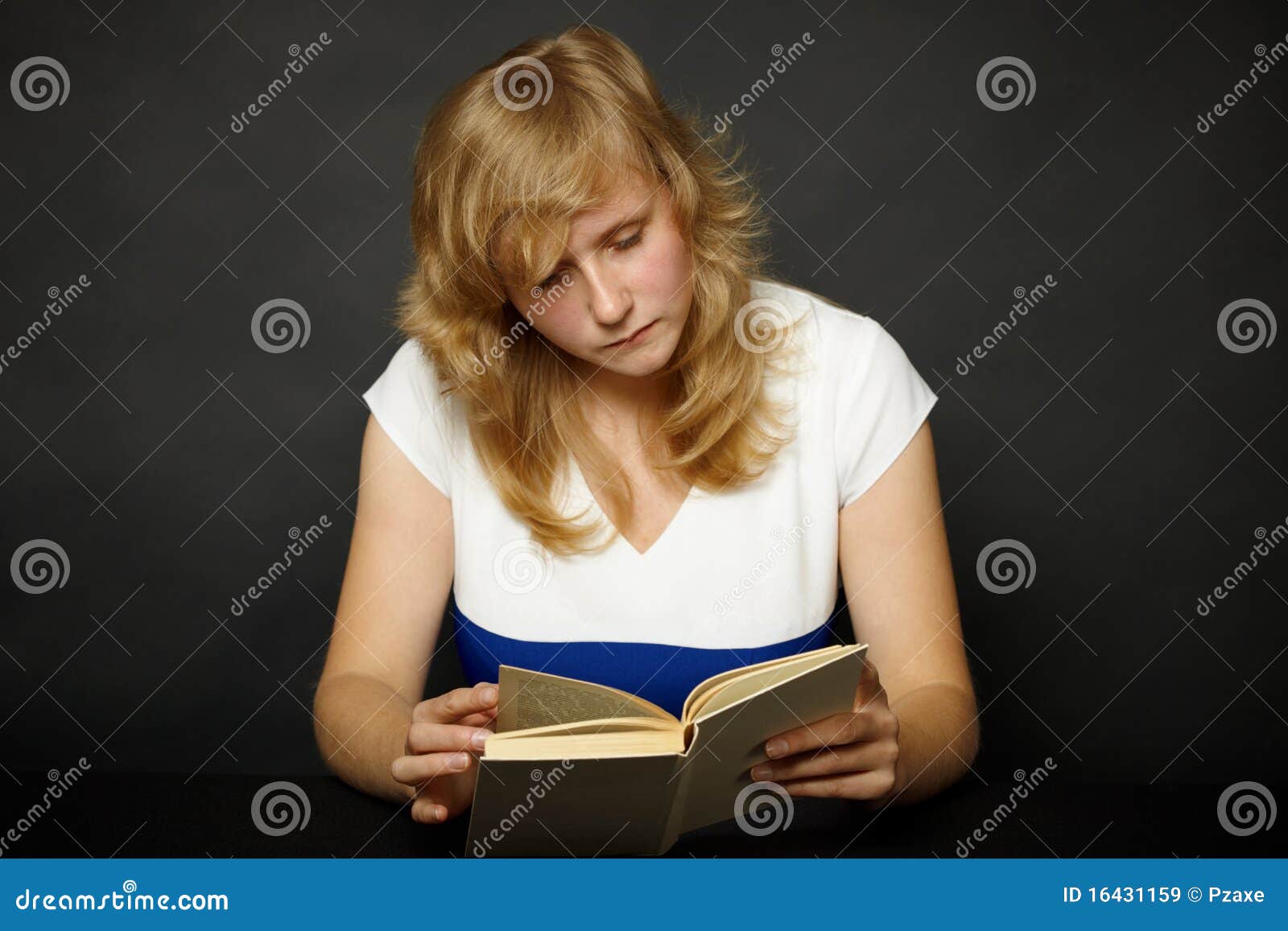 Woman Reading Book at Night Stock Image - Image of young, person: 16431159