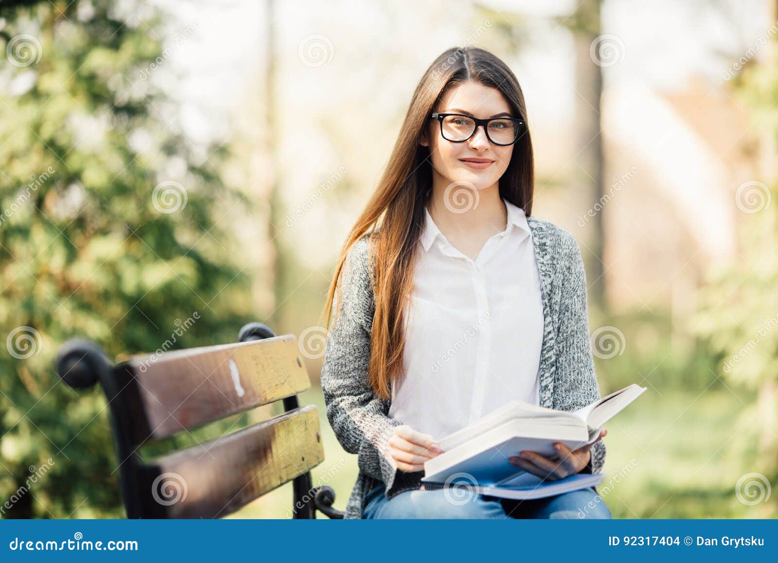 Woman Reading Book on Park Bench Stock Photo - Image of happiness ...