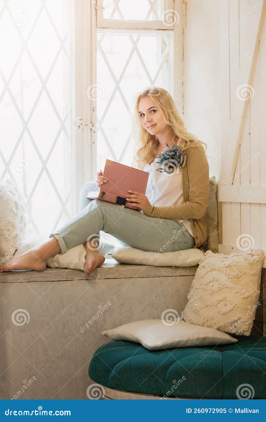 A Woman with is Reading a Book by the Window Stock Image - Image of ...