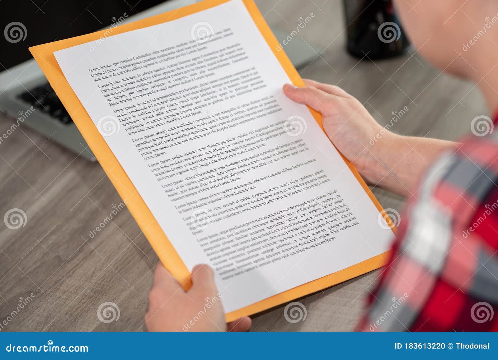 Woman checking a document stock photo. Image of woman - 183613220