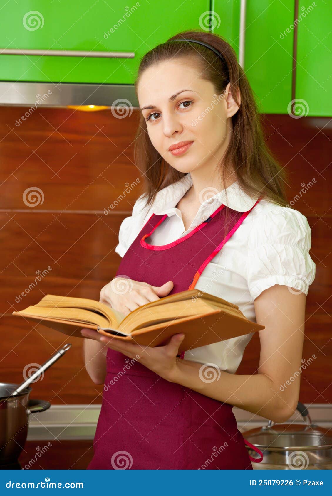 Woman Reading a Cookbook on Kitchen Stock Photo - Image of smiling ...
