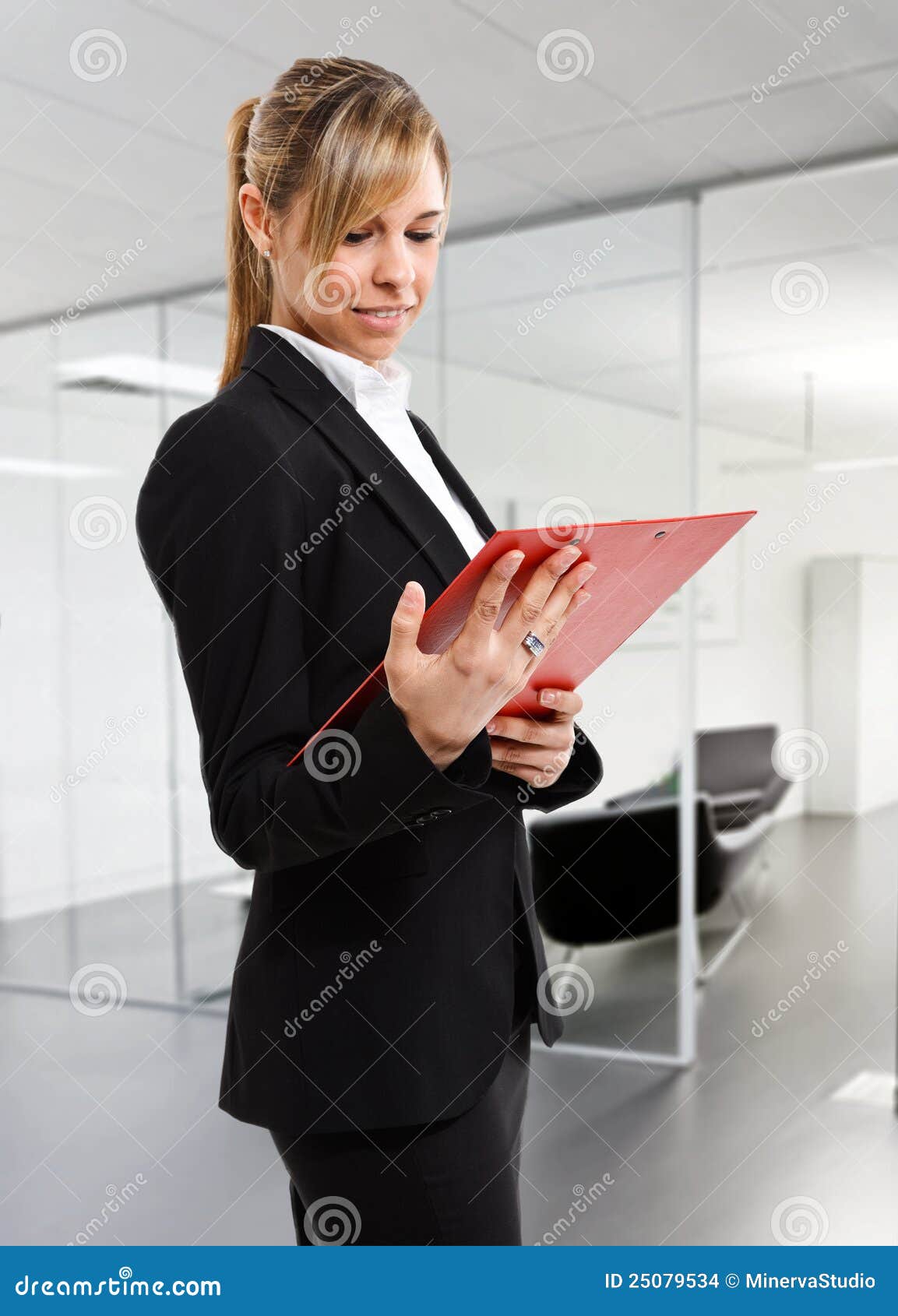 Woman reading a document stock photo. Image of optimism - 25079534