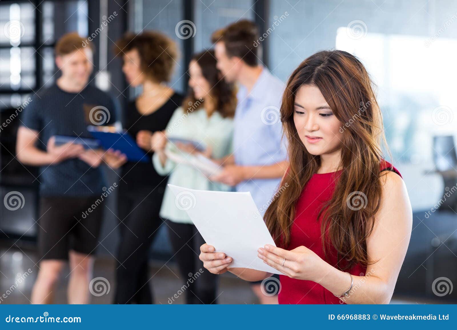 Woman Reading a Document in Office Stock Image - Image of asian ...