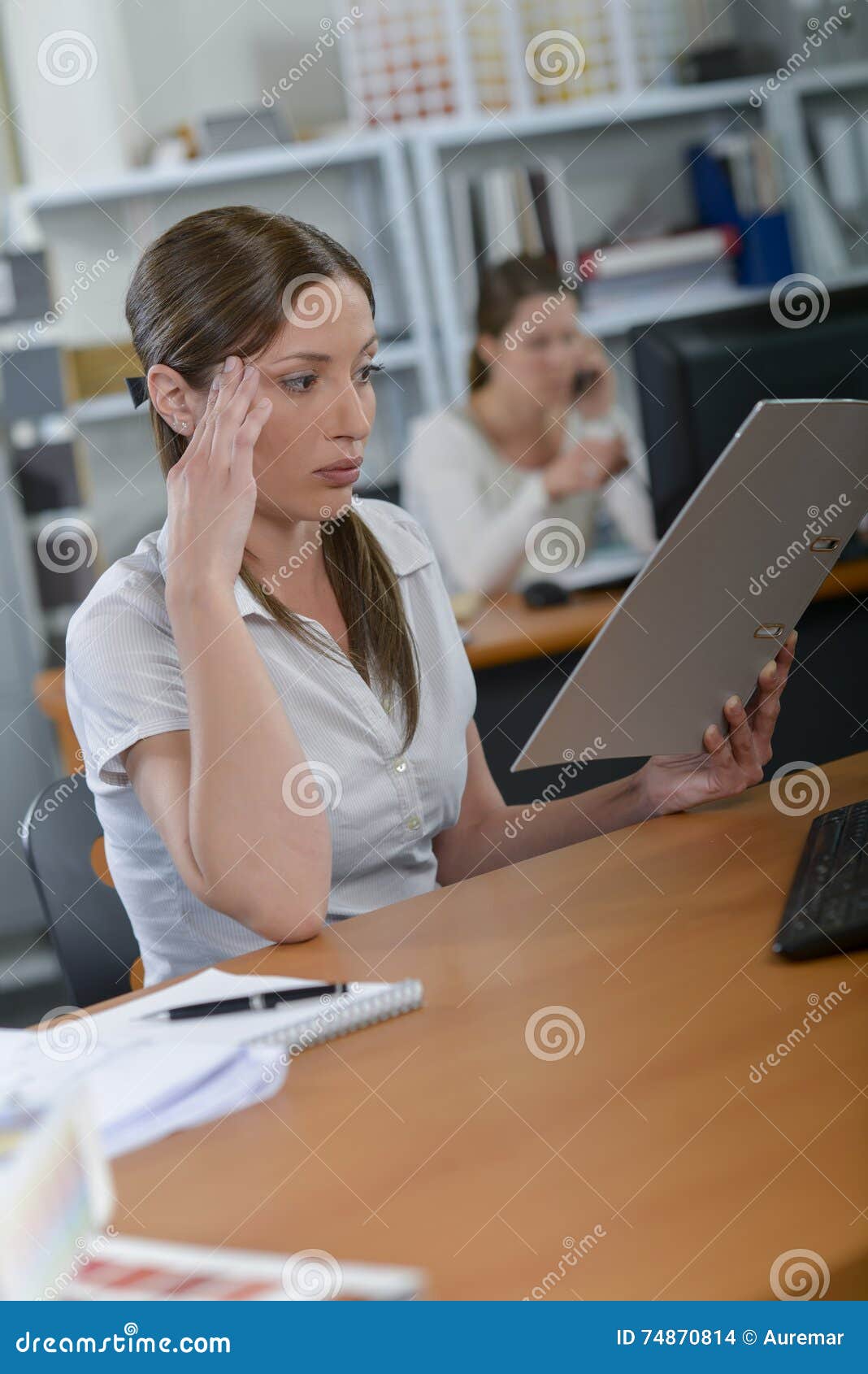 Woman Reading Documert at Desk Stock Photo - Image of sitting, learning ...