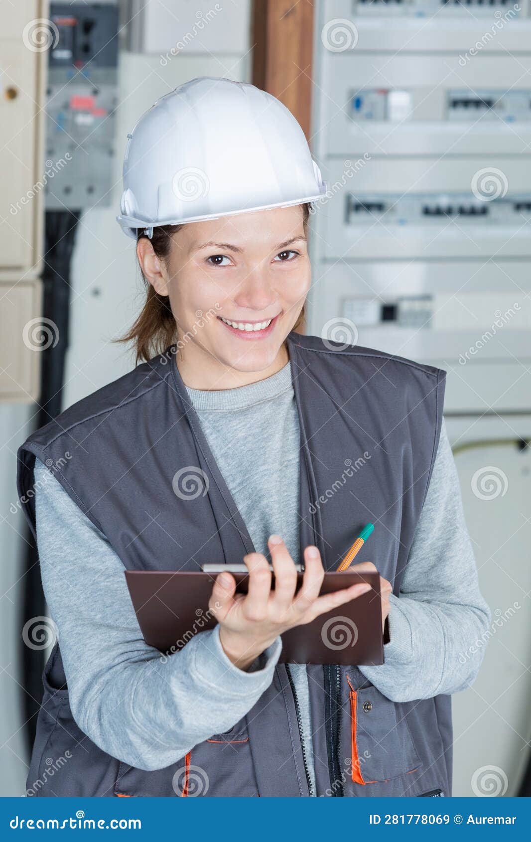 Woman reading electrical stock image. Image of safety - 281778069