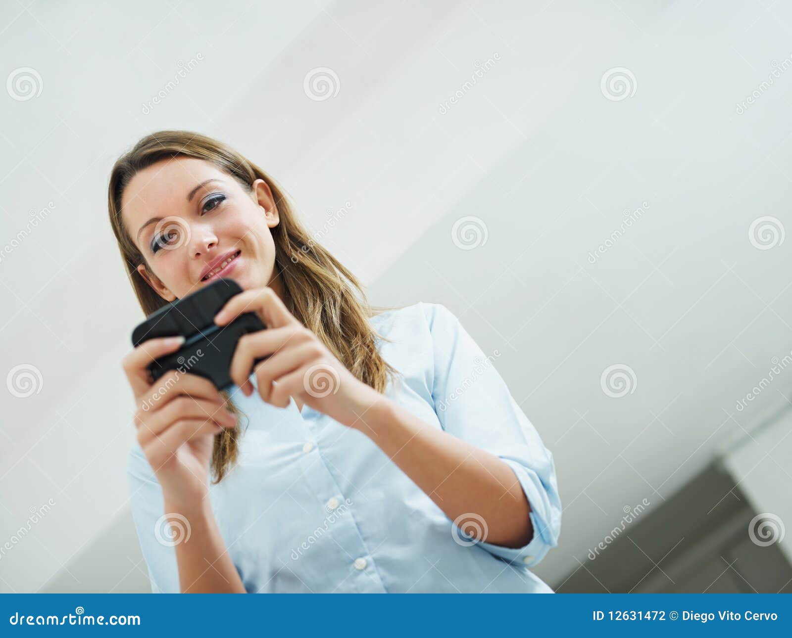 Woman reading emails stock photo. Image of office, cell - 12631472