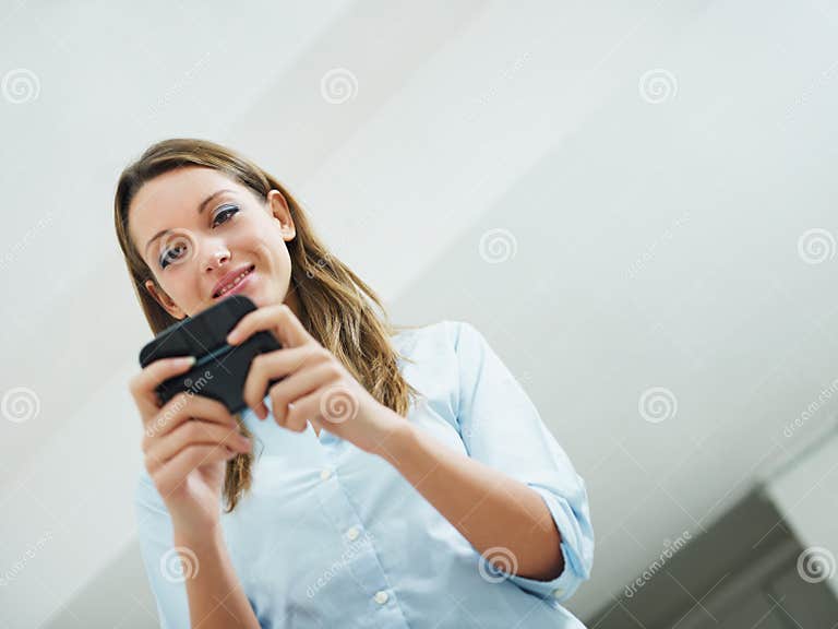 Woman reading emails stock photo. Image of office, cell - 12631472
