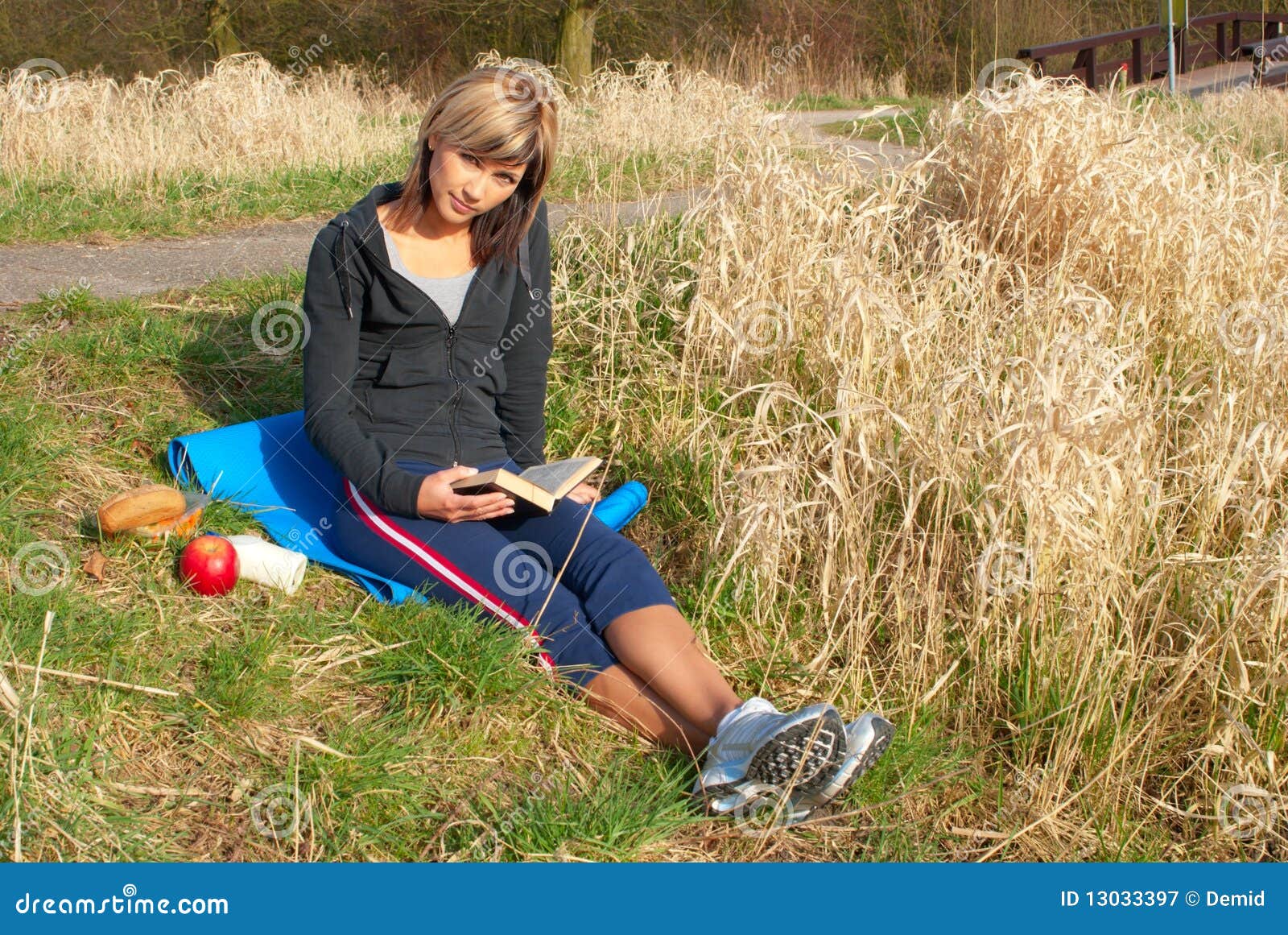 Woman Reading on Grass stock image. Image of grass, lifestyle - 13033397