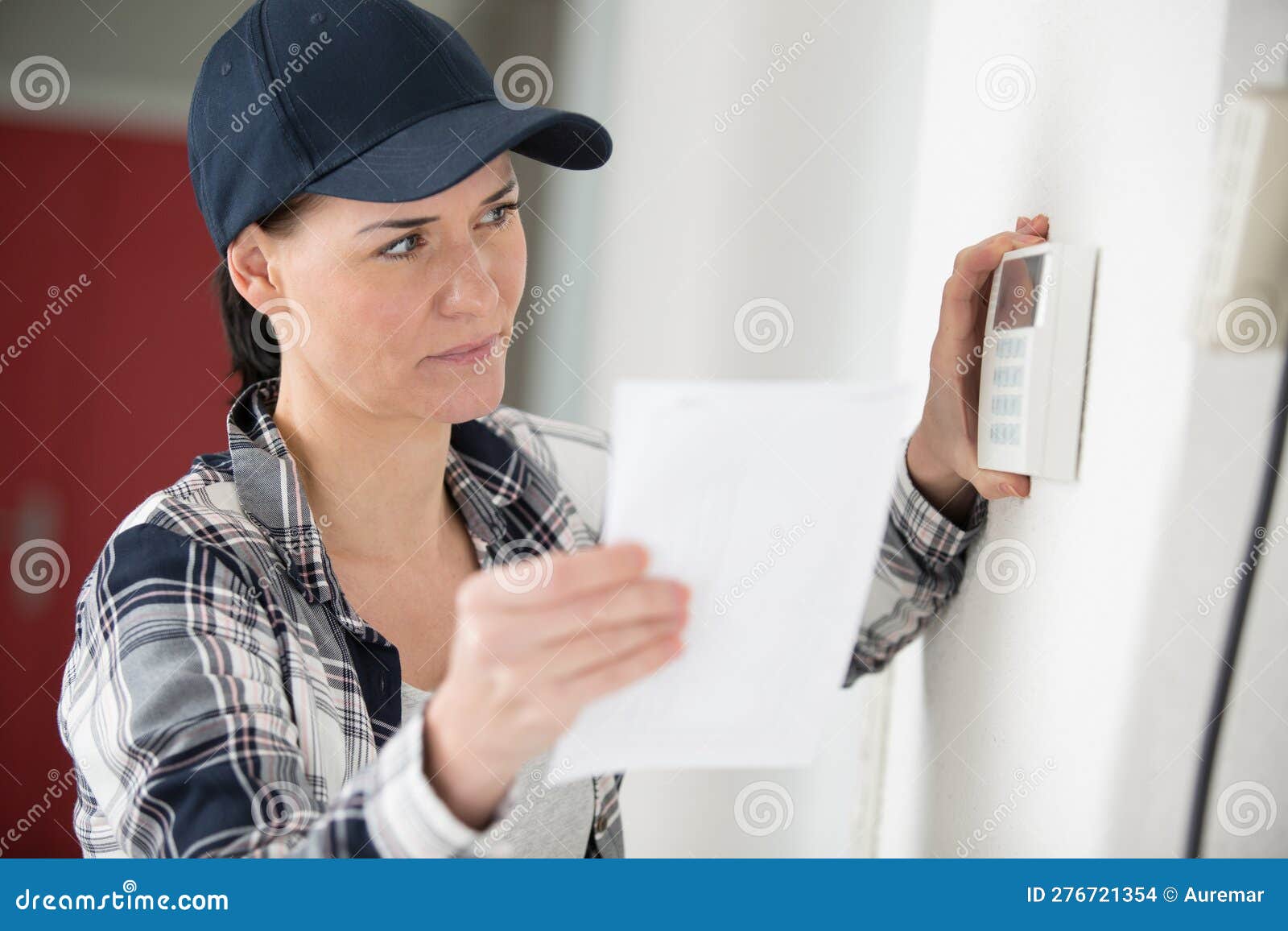 Woman Reading Instructions for Installation Control Panel Stock Photo ...