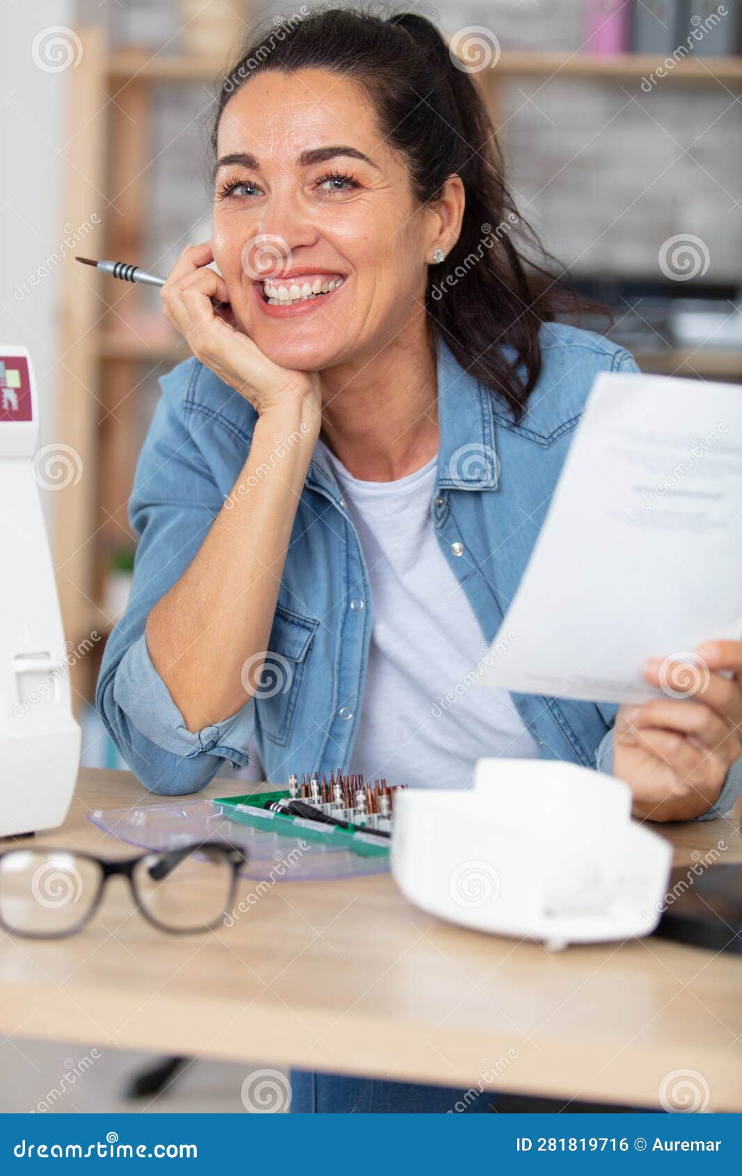 Woman Reading Instructions for Sewing Machine Stock Photo - Image of ...
