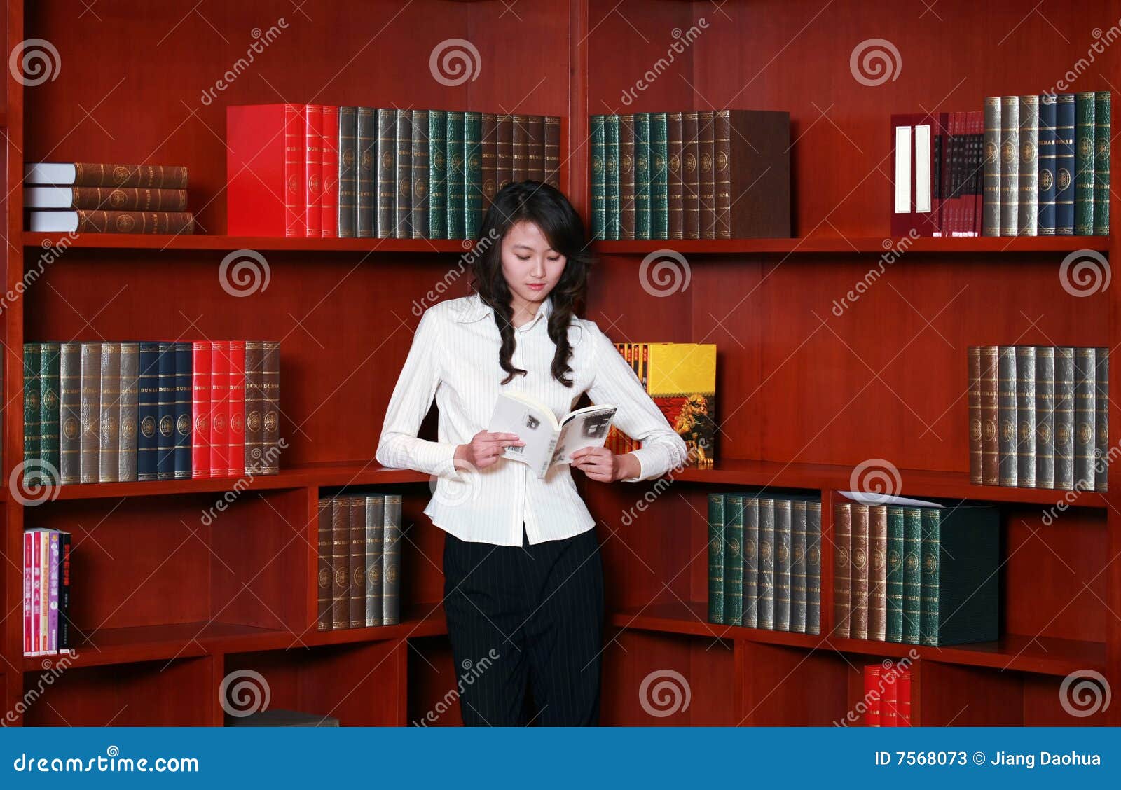 Woman reading in library stock image. Image of information - 7568073
