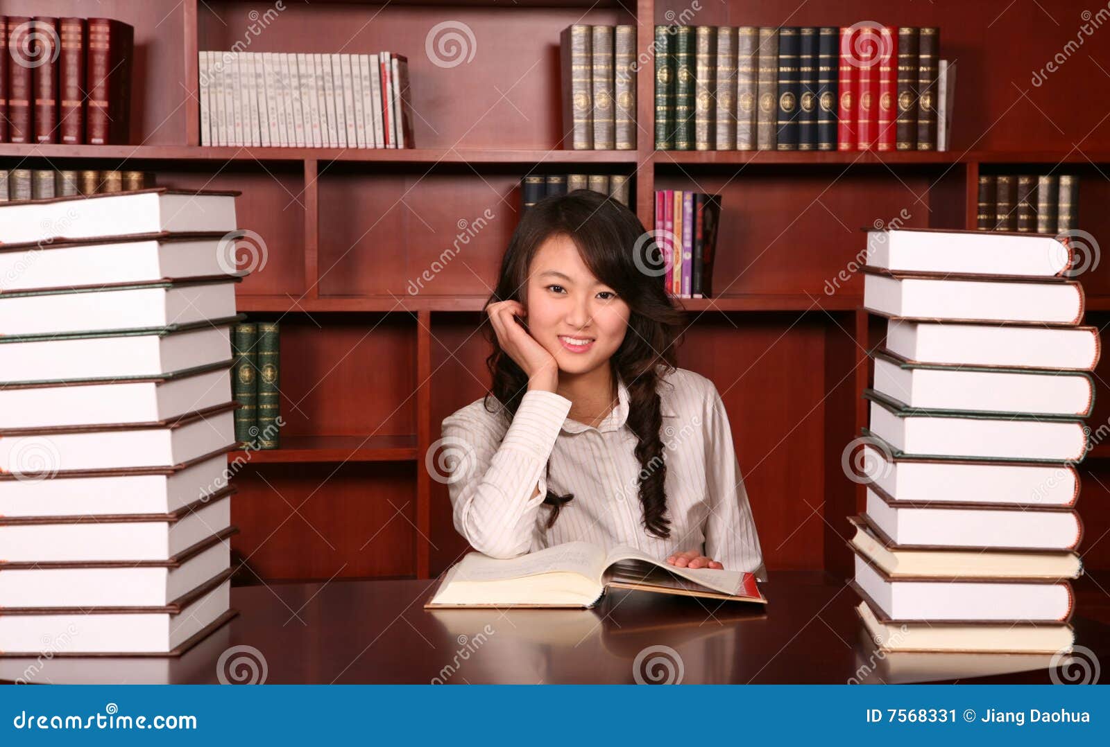 Woman reading in library stock image. Image of publishing - 7568331