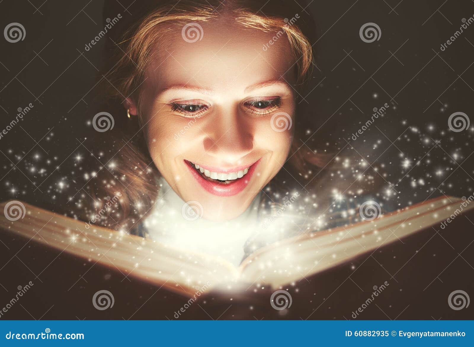 Woman reading a magic book stock image. Image of happy - 60882935