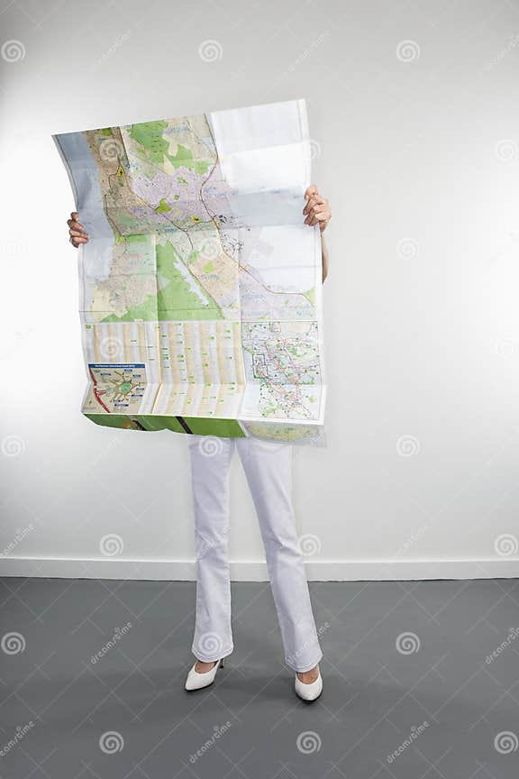 Woman reading map. stock photo. Image of navigation, indoors - 3470280