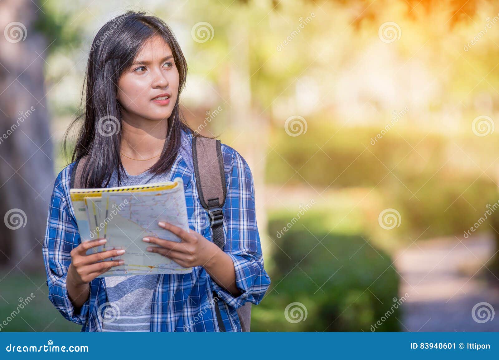 Woman reading a map stock image. Image of long, discovery - 83940601