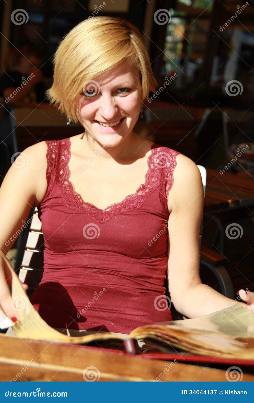 Woman reading menu card stock image. Image of lady, table - 34044137