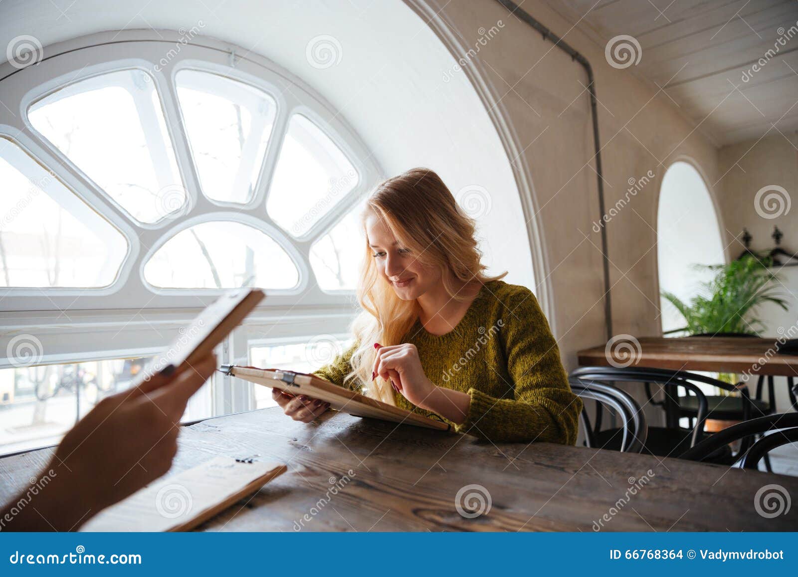 Woman reading menu stock photo. Image of attractive, girl - 66768364