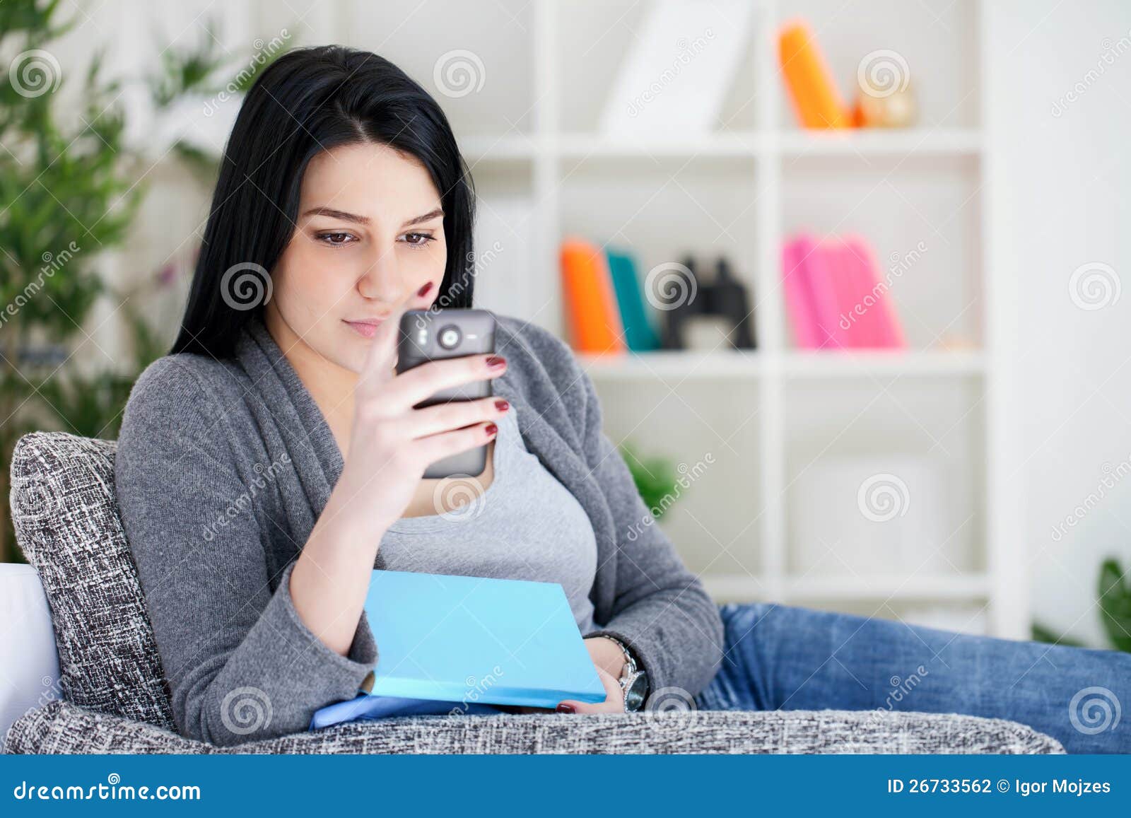 Woman Reading Message on Mobile Phone Stock Photo - Image of attractive ...