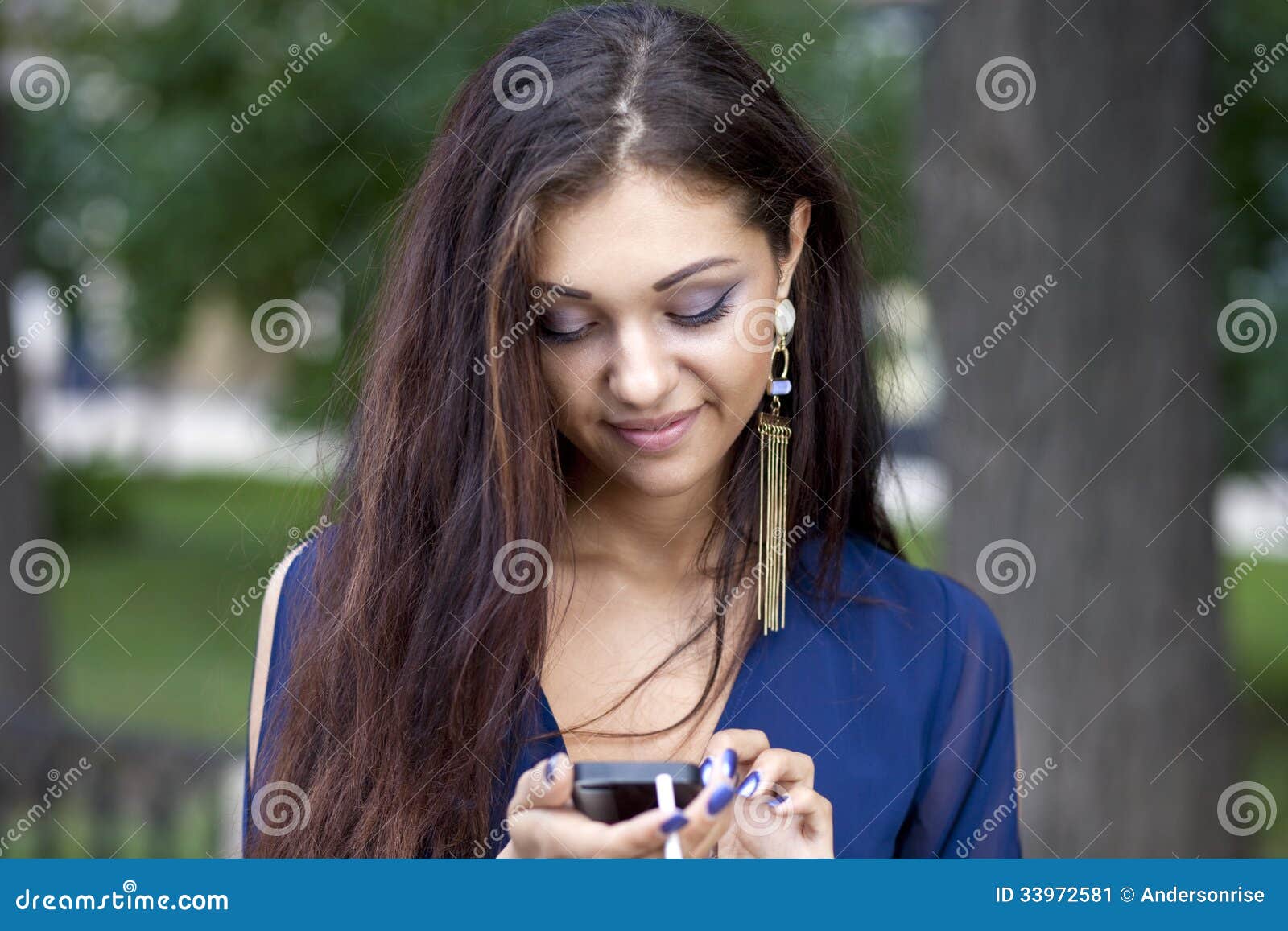 Woman Reading a Message on the Phone Stock Image - Image of cheerful ...