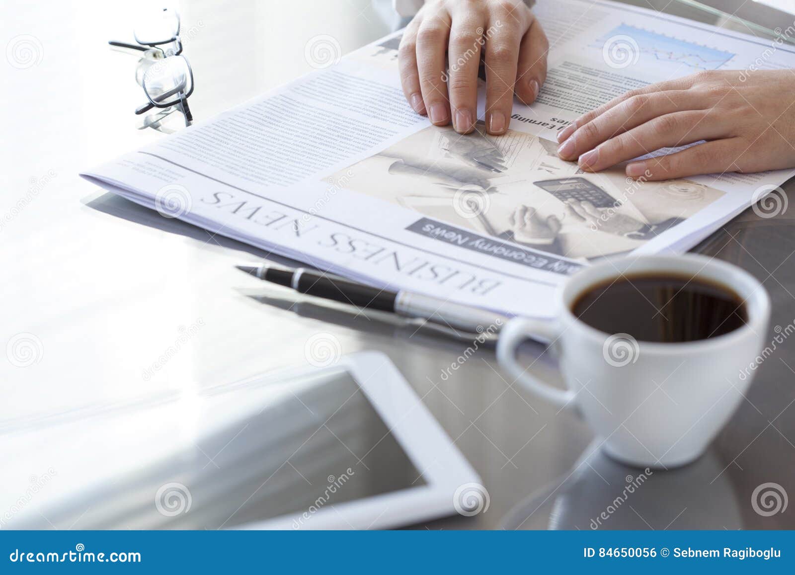 Woman Reading Newspaper on Table Stock Photo - Image of paper, holding ...