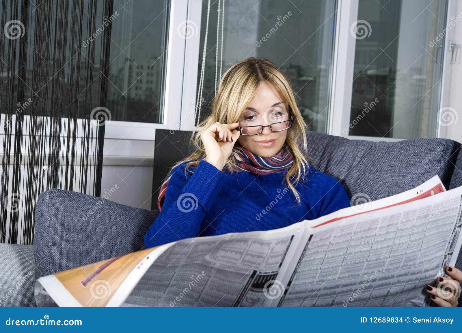 Woman reading the paper stock photo. Image of casual - 12689834