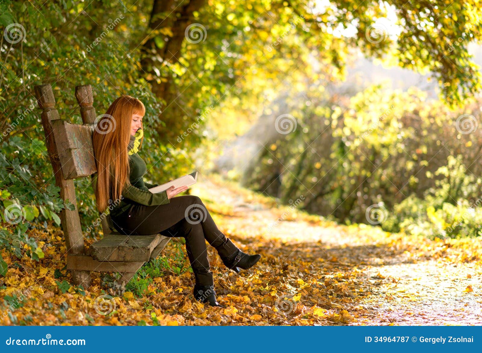 Woman reading in the park stock image. Image of gray - 34964787