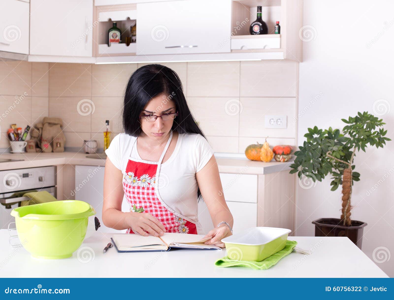 Woman reading recipe stock photo. Image of kitchen, beating - 60756322