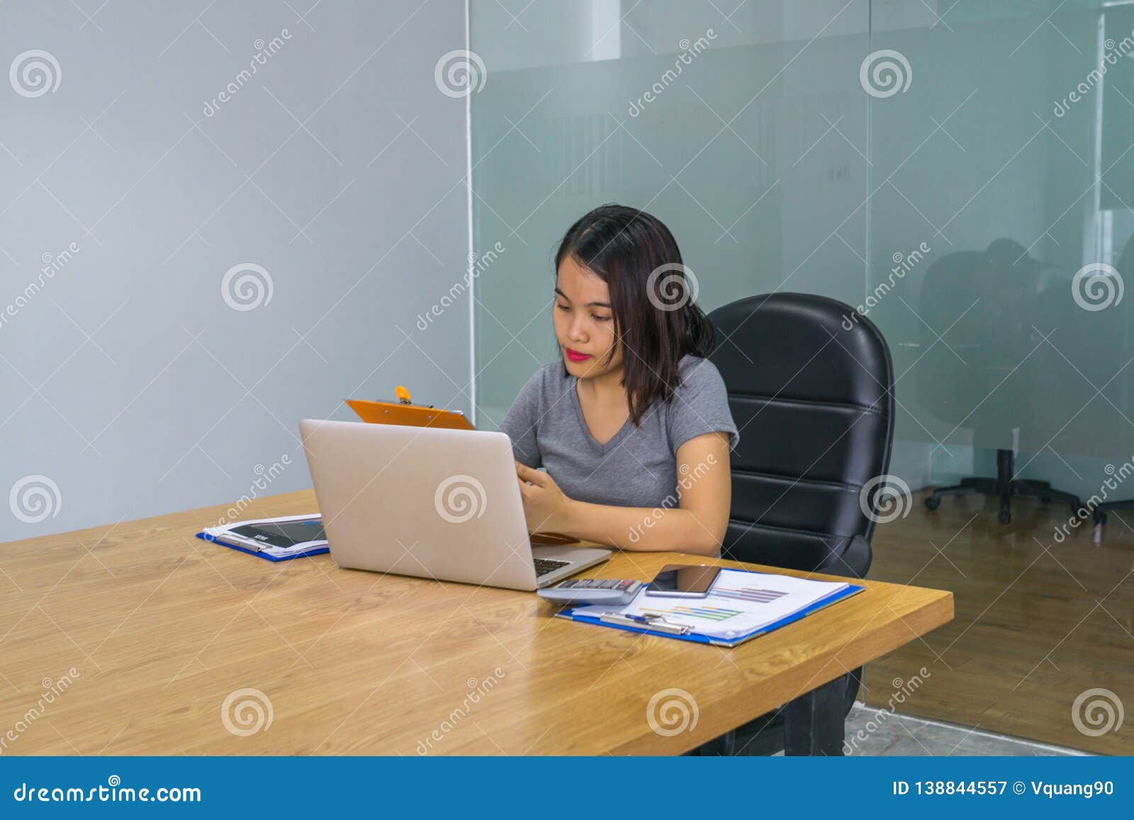 Woman Reading Report at Office Stock Image - Image of person, business ...