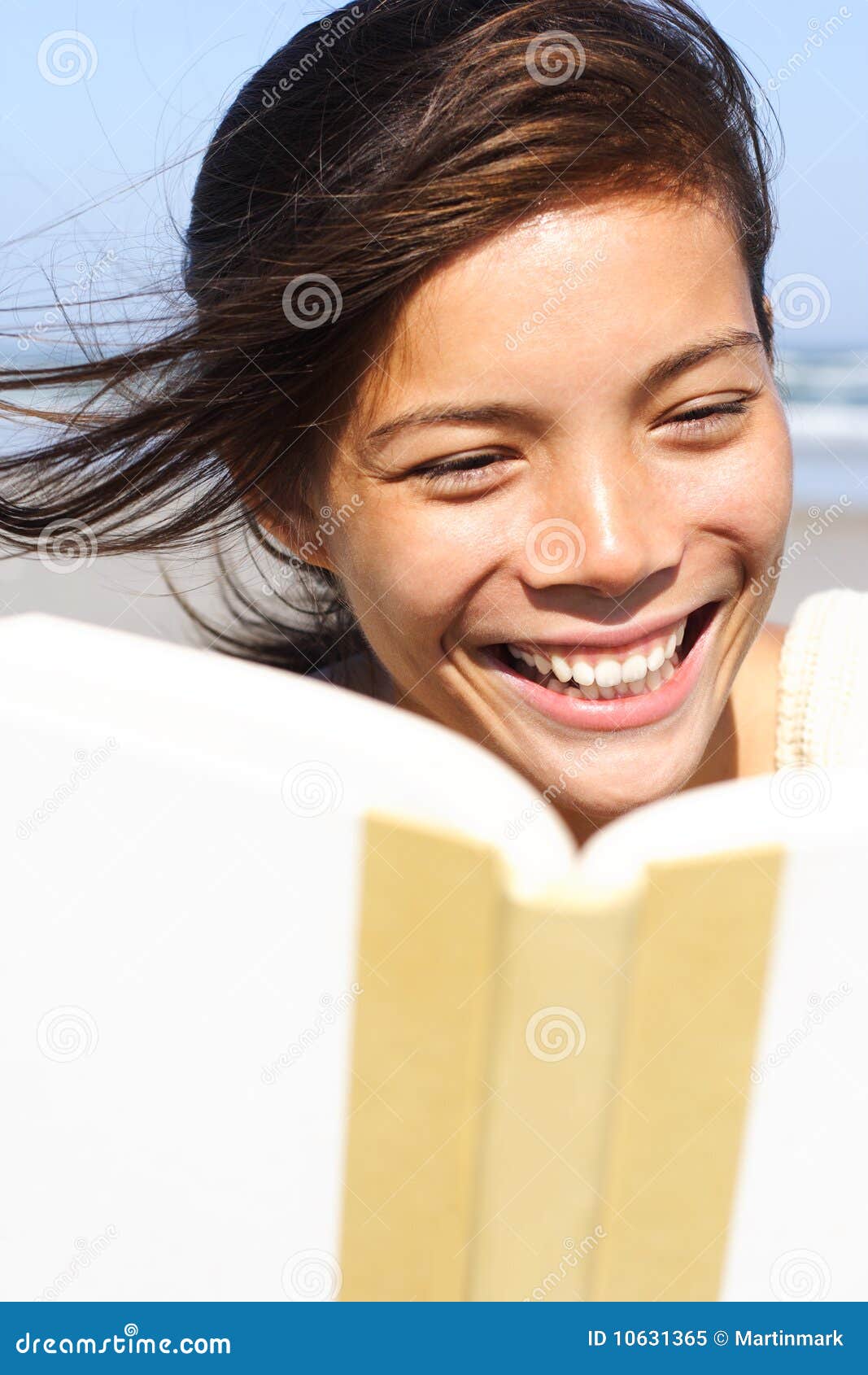 Woman reading smiling stock image. Image of asian, novel - 10631365
