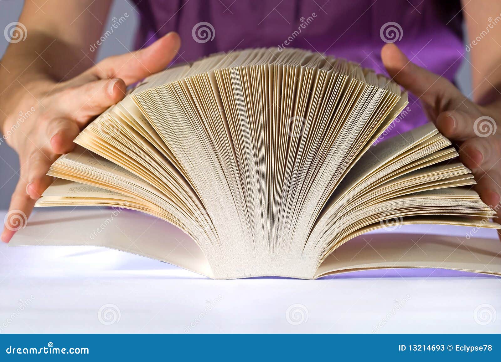 Woman reading a thick book stock image. Image of page - 13214693