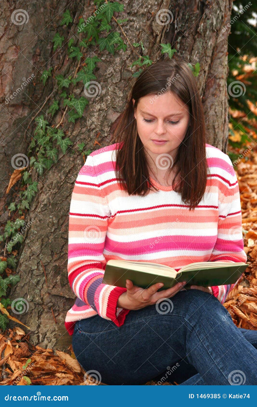 Woman Reading Under a Tree in Autumn Stock Image - Image of colorful ...