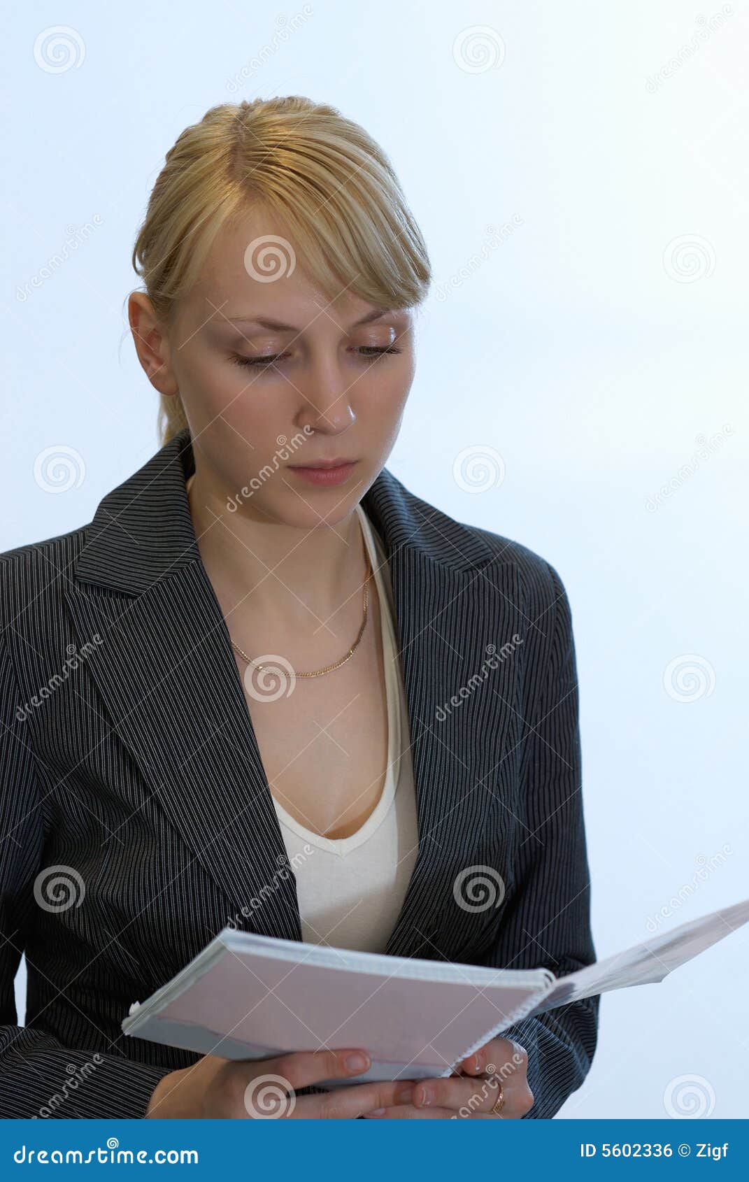 Woman reads a writing-book stock photo. Image of occupation - 5602336